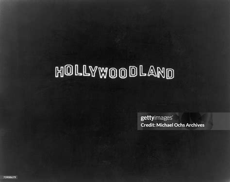 The Illuminated Hollywoodland Sign At Night On Mount Lee In The News