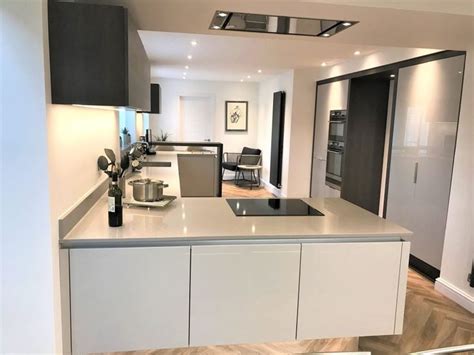 Contemporary Handleless Linear Kitchen With Double Peninsular Nkbco Galley Style Kitchen