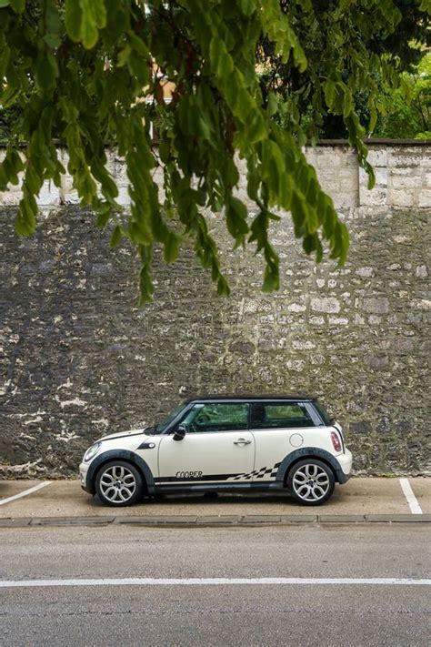 White Mini Cooper Parked Next To An Old Stone Wall In Zadar Croatia Editorial Stock Image