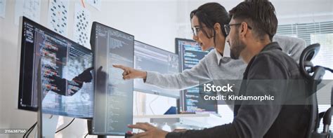 Hispanic Latin American Couple Software Engineer Developer Use Computer Work On Program Coding