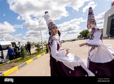 Kazakh Women Dressed In A Traditional Costume During The Ceremony Of