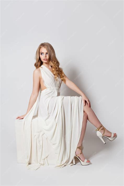 Premium Photo Fashion Model Girl In White Dress And Legs In High