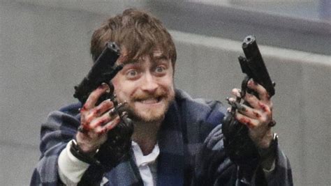 Daniel Radcliffe Is A Long Way From Harry Potter With Guns Akimbo