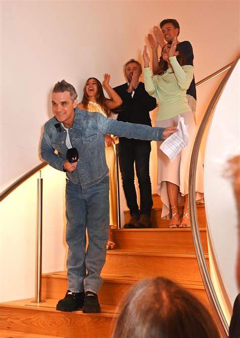 Celebs Gather In Support Of Robbie Williams At Launch Of Singers Art