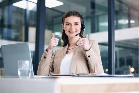 Thank You Portrait Of Call Center Agent With Thumbs Up And Headset At