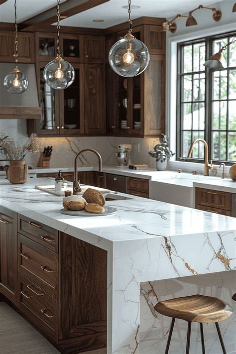 Luxurious Kitchen With Marble Waterfall Island And Wood Cabinets