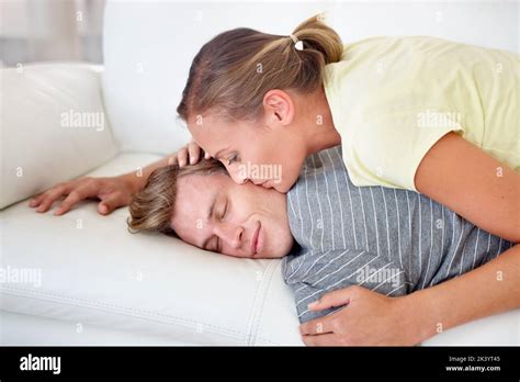 My Sleeping Prince A Woman Leaning Over And Kissing Her Boyfriend