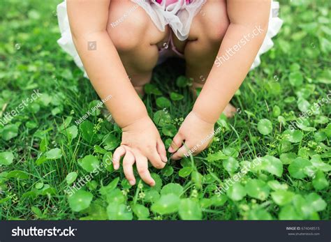 Small Hands Feet Kid On Green Stock Photo Shutterstock