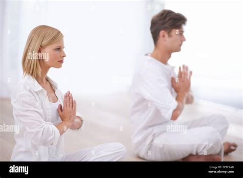 Finding Inner Peace Together Two People Sitting Cross Legged And Doing