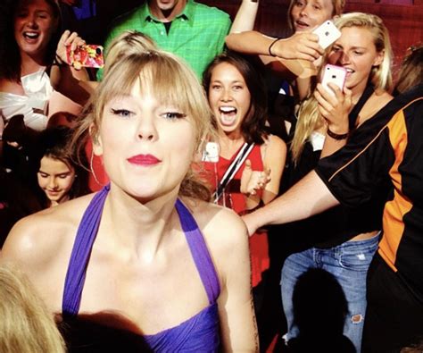 Kelly Slater Toasts Taylor Swift On Engagement With Photobomb Surfer