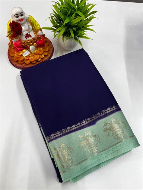 Semi Crepe Saree Featuring A Stunning Garuda Border From Padmavathi Si Padmavathi Silks And Sarees
