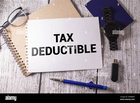 White Paper With Text Tax Deductions On A Yellow Background With