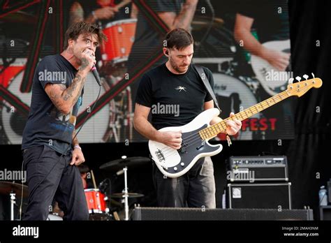 Anthony Green Left And Tim Payne Of The Band Ls Dunes Perform On Day One Of Riot Fest On