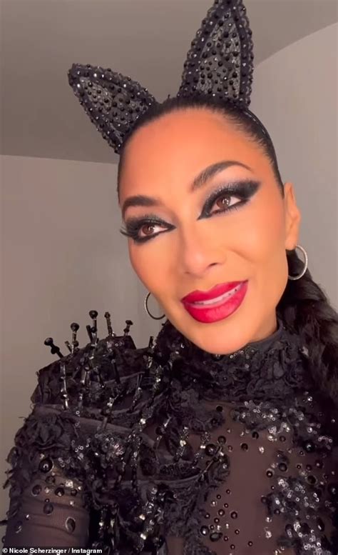 Nicole Scherzinger Poses In Striking Eye Makeup And Feline Ears As She