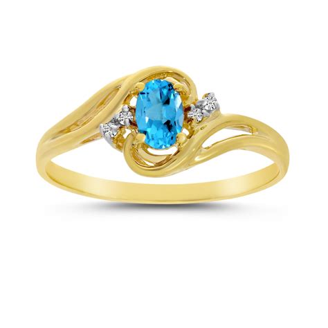 14k Yellow Gold Oval Blue Topaz And Diamond Ring
