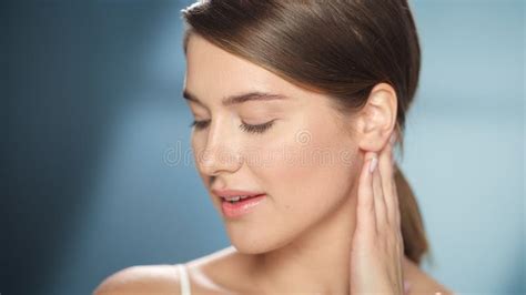 Female Beauty Portrait Smiling Caucasian Woman With Brown Hair Embarrassed Posing Touching