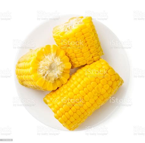 Boiled Corn Slices In A Plate Closeup On A White Background Isolated