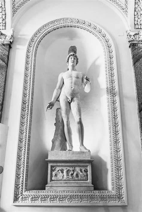 Black And White Photo Of Ancient Roman Sculpture Of A Naked Soldier