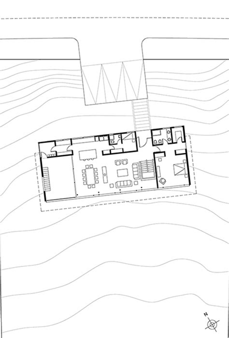 Timber Lined Roof Perches At An Angle On Chilean Seaside Home
