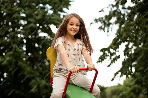 Free Photo Front View Of Beautiful Happy Girl In Park
