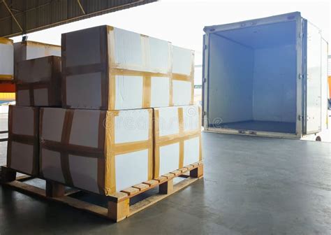 Package Boxes Stack On Pallets Loading Into Cargo Trucks Supply Chain Shipment Supplies