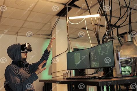 Hacker Coding Spyware In Vr Cracking Password In Metaverse Stock Image