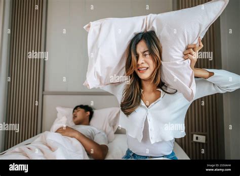 Selective Focus Young Pretty Woman Has Problem Form Her Husband Snoring While Sleeping On Bed