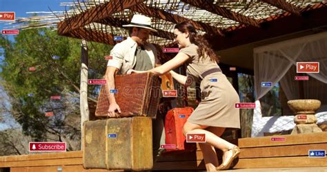 Passing Couple Transferring Vintage Suitcases On Safari Veranda Beneath