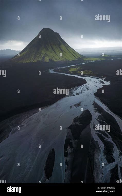 A Stunning Aerial Photograph Capturing The Majestic Maelifell Volcano Surrounded By Dark