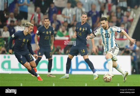 Argentinas Lionel Messi Runs At Frances Antoine Griezmann During The