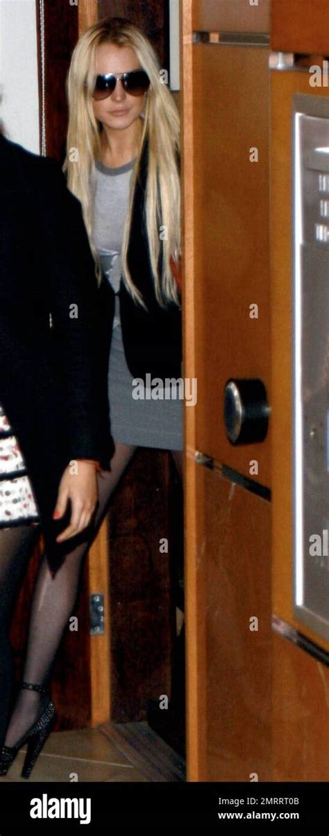 Lindsay Lohan Sports A Ladder In Her Leggings As She Leaves A Lunch