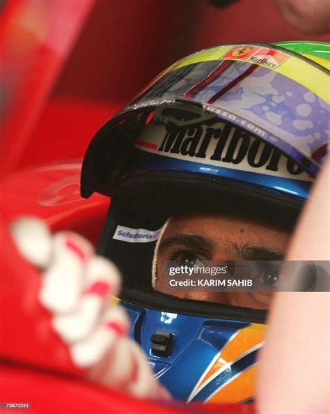Brazilian Ferrari Driver Felipe Massa Sits In His Car In The Pits Of News Photo Getty Images