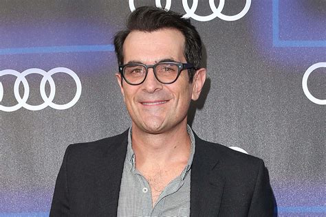 Download Actor Ty Burrell Smiling At An Event Wallpaper
