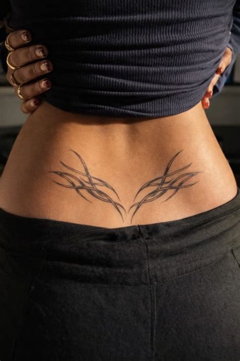 16 Tramp Stamp Tattoo Designs To Make A Stylish Comeback Tattoosofasia