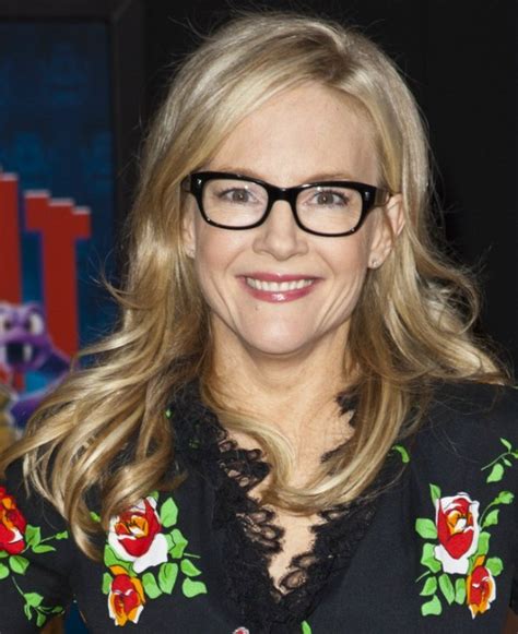 Rachael Harris Long Hair With Curled Ends And Black Framed Glasses