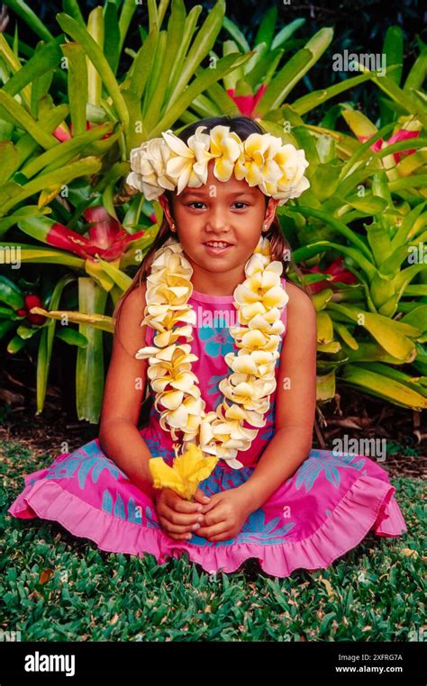 A Young Hawaiian Girl Model Released Wearing A Plumeria Flower Lei
