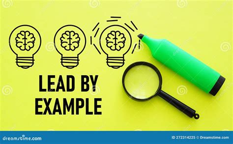 Lead By Example Is Shown Using The Text And Picture Of Lamps Stock