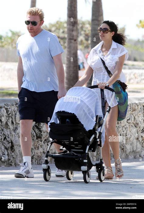 Tennis Ace Boris Becker Walks Along Miami Beach Boardwalk Yawning And