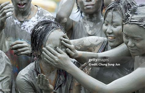 Participants Enjoy The Mud On The West Coast Beach During The News Photo Getty Images