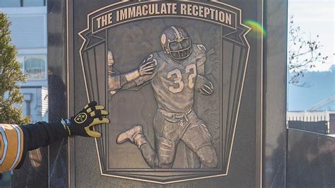 Immaculate Reception Statue