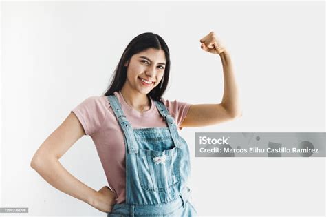 Young Latin Woman With Positive Expression Face On White Background In