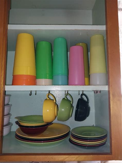 Tupperware Drinking Glasses And Colored Dishes