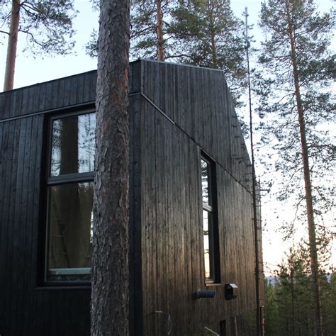 Snøhettas Charred Timber Treehouse To Be Added To Swedens Treehotel