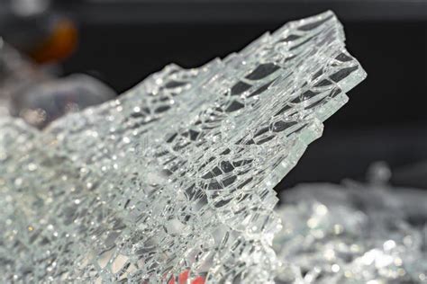 Close Up Of The Broken Windshield On The Car Cracks In The Glass After A Car Accident Close Up