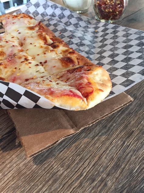 Chicago Style Flatbread On Cardboard Scrolller