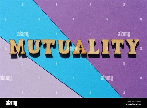Mutuality Word In Wooden Alphabet Letters Isolated On Background