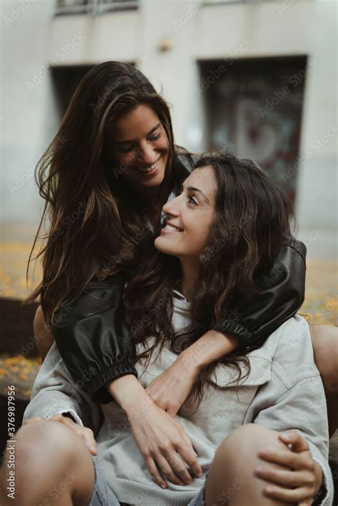 Lesbian Couple Girls Hug Each Other And Look Each Other In The Eye L