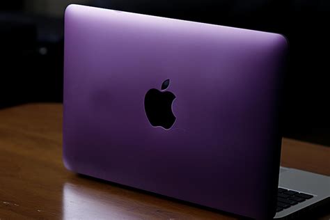 Premium Photo Plum Themed Laptop Stickers Arranged Creatively