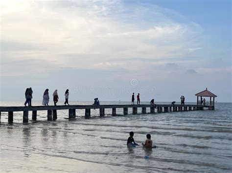 View Of Karang Ginger Beach Central Java With A Wooden Bridge And Hut