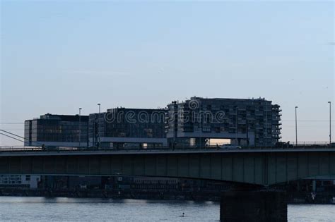An Overpass With The Bridge Crossing In The Background With Buildings